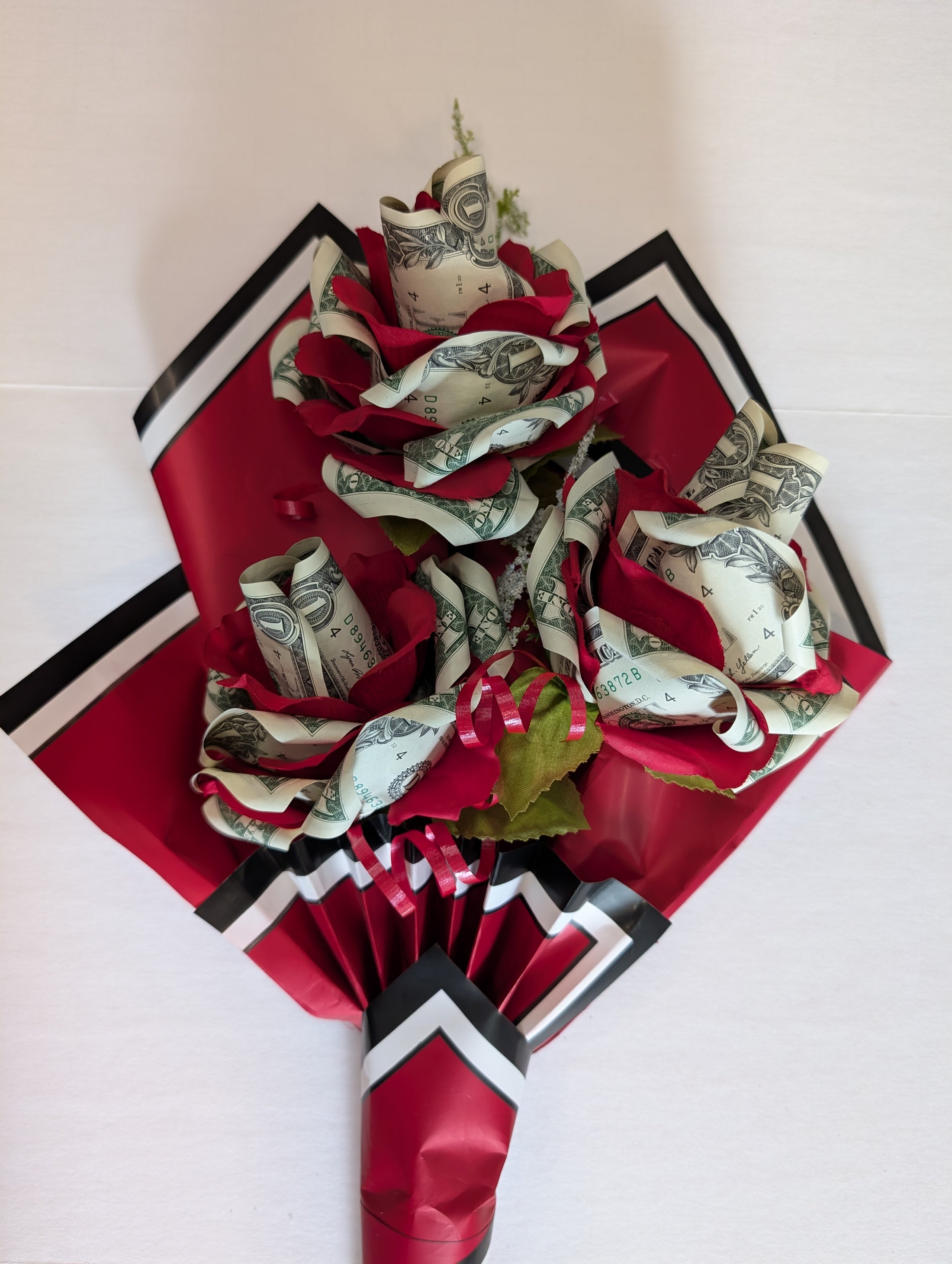 Handheld Money Bouquets with faux foam roses sprayed with glitter. In ...